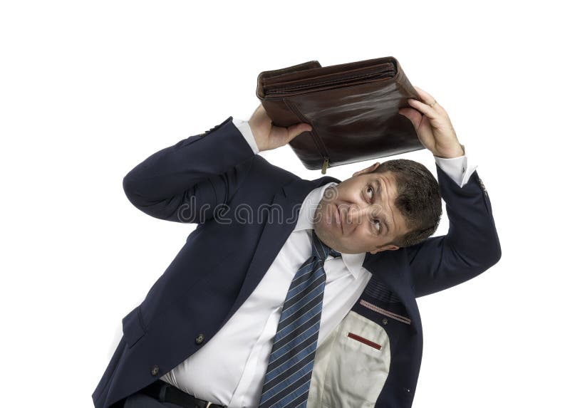 Businessman Holding Briefcase Over Head Stock Photo - Image of ...