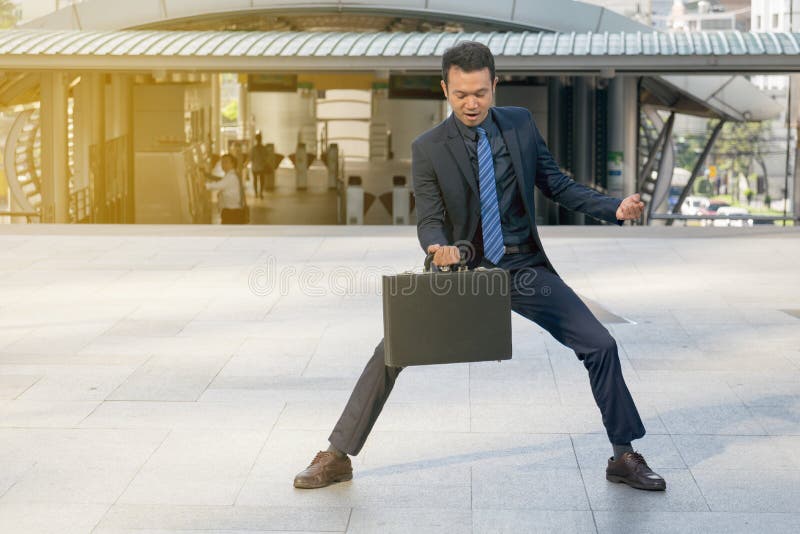 Businessman Holding a Briefcase, Powerful Businessman Stock Photo ...