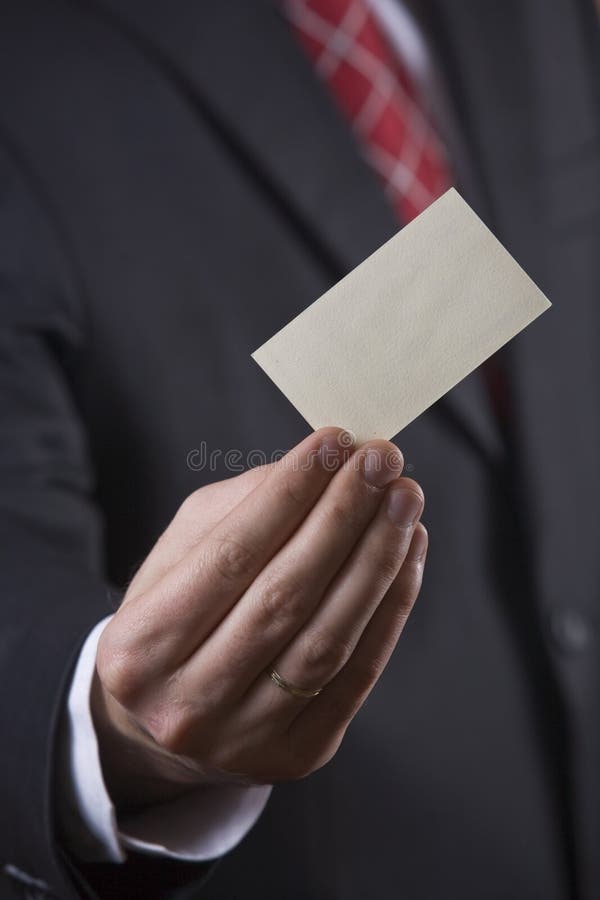 Businessman holding card stock image. Image of communication - 18322819