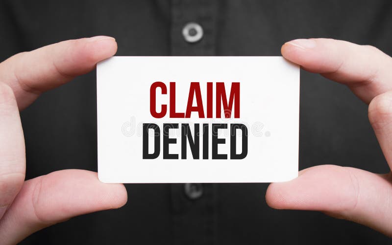 Businessman Holding a Card with Text CLAIM DENIED,business Concept ... Businessman Holding a Card with Text CLAIM DENIED,business Concept ...