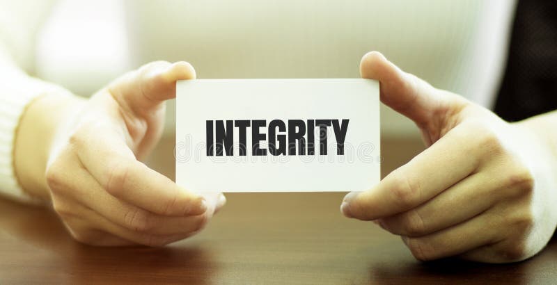 Businessman Holding a Card with Text INTEGRITY Stock Photo - Image of ...