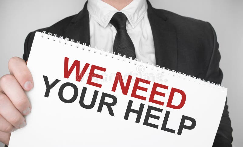 Businessman Holding a Card with Text we Need Your Help Stock Photo ...