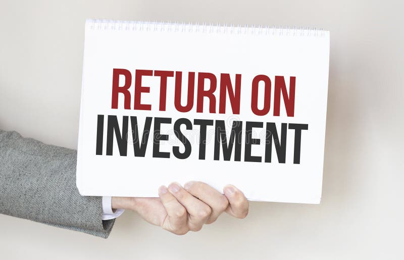 Businessman Holding a Card with Text Return on Investment Stock Photo ...