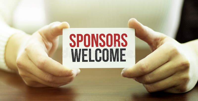 Businessman Holding a Card with Text SPONSORS WELCOME Stock Image ...