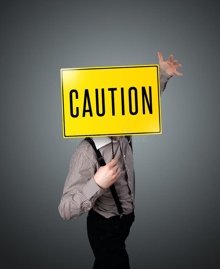 Businessman Holding a Caution Sign Stock Image - Image of hazard ...