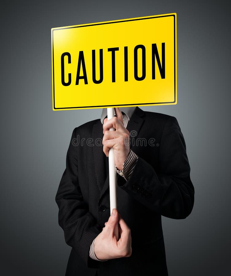 Businessman Holding a Caution Sign Stock Image - Image of boss, concept ...