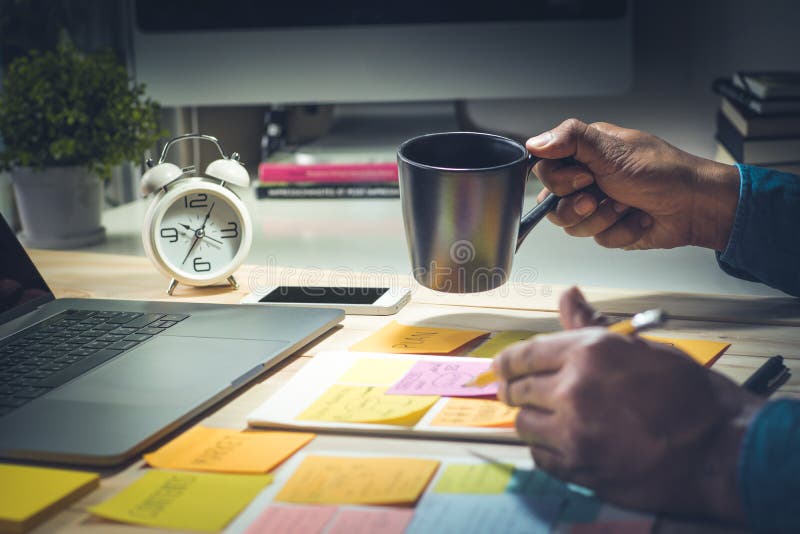 Businessman Holding Cup of Coffee.work on Night Concept Stock Photo ... Businessman Holding Cup of Coffee.work on Night Concept Stock Photo ...