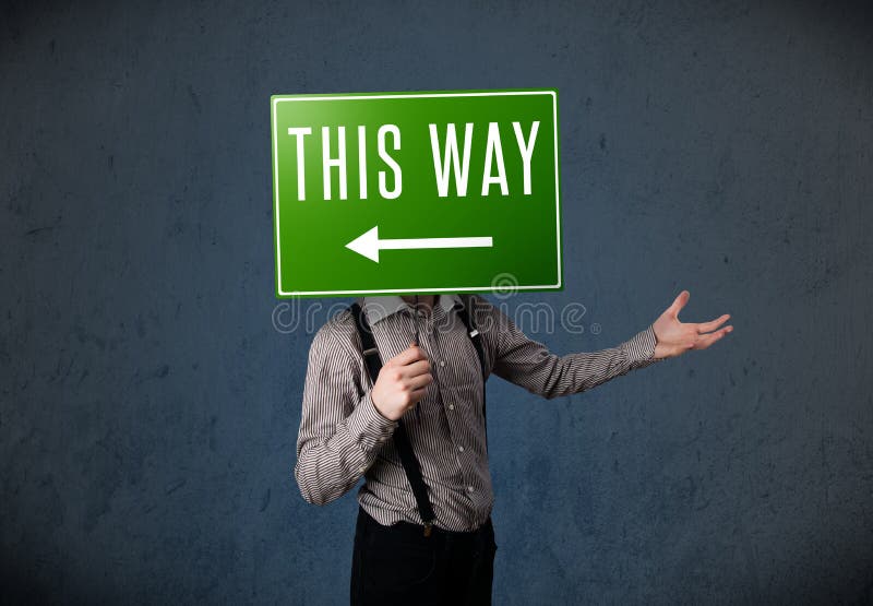 Businessman Holding a Direction Sign Stock Photo - Image of choice ...