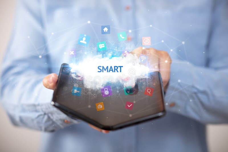 Businessman Holding a Foldable Smartphone, Technology Concept Stock ...