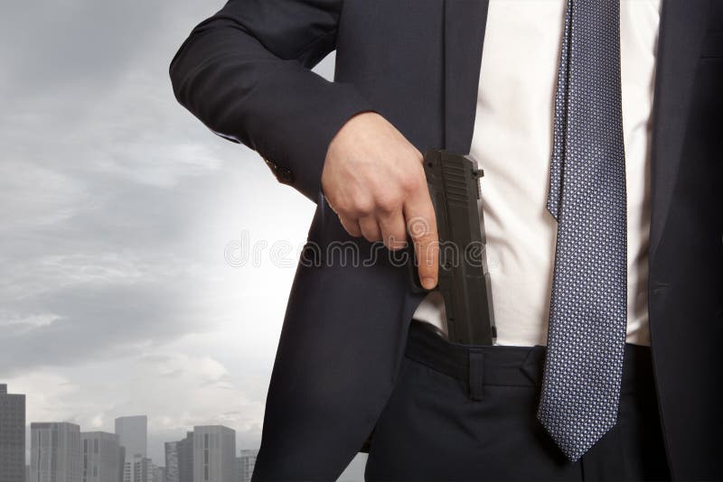 Man Suit Grabbing Gun Stock Photos - Free & Royalty-Free Stock Photos ...