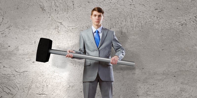 Businessman holding hammer stock image. Image of brave - 43020207