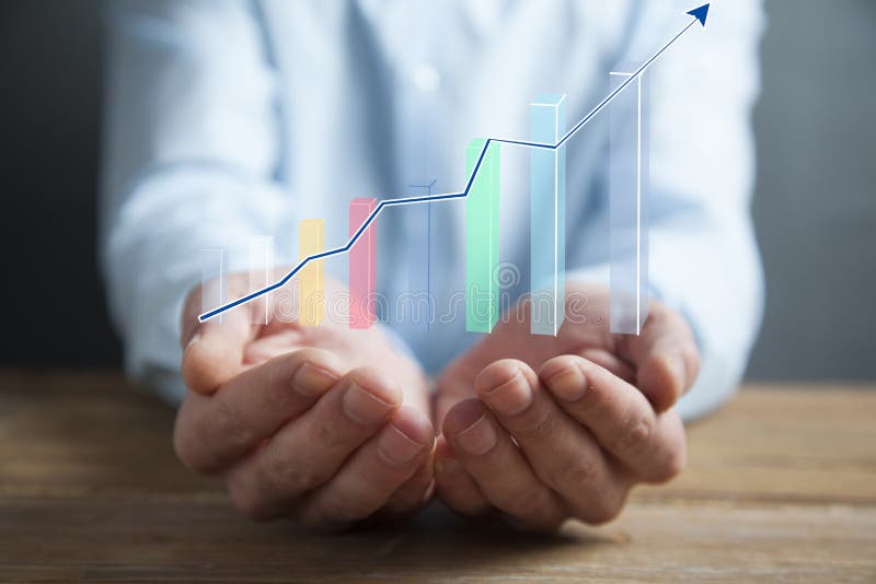 Businessman Holding a Hand-drawn Bar Graph in His Hand Stock Photo ...