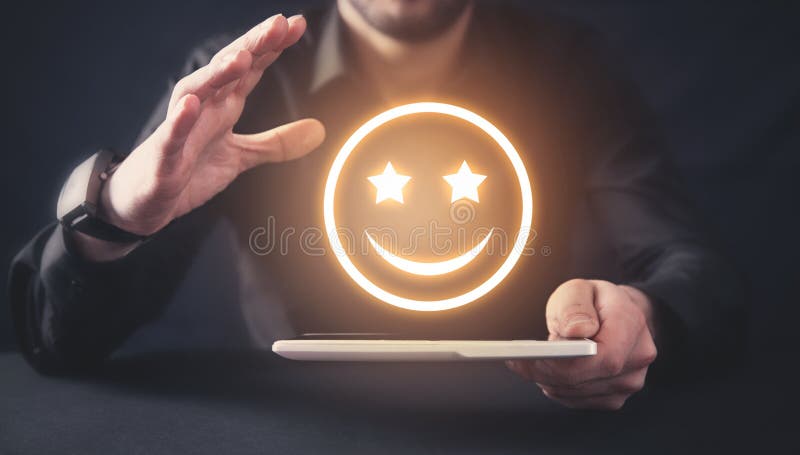 Businessman Holding Happy Icon. Customer Experience Concept Stock Photo ...