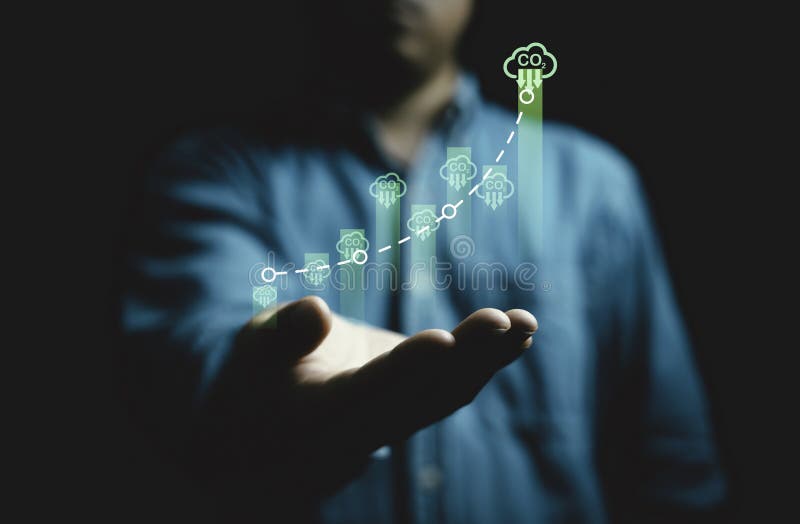 Businessman Holding Increasing Graph with CO2 Reducing Icon for ...