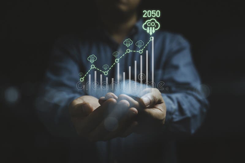 Businessman Holding Increasing Graph with CO2 Reducing Icon for Decrease CO2 , Carbon Footprint ...