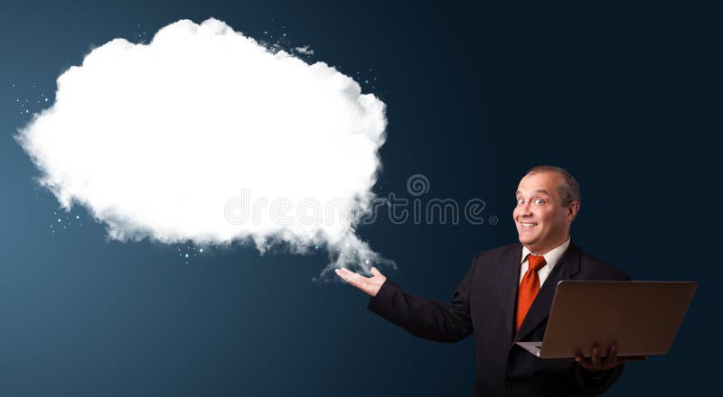 Businessman Holding a Laptop and Presenting Abstract Cloud Copy Stock ...