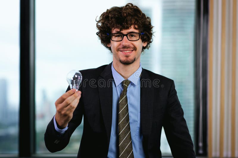 Businessman Holding Light Bulb. Brain Creative Thinking Ideas and ...
