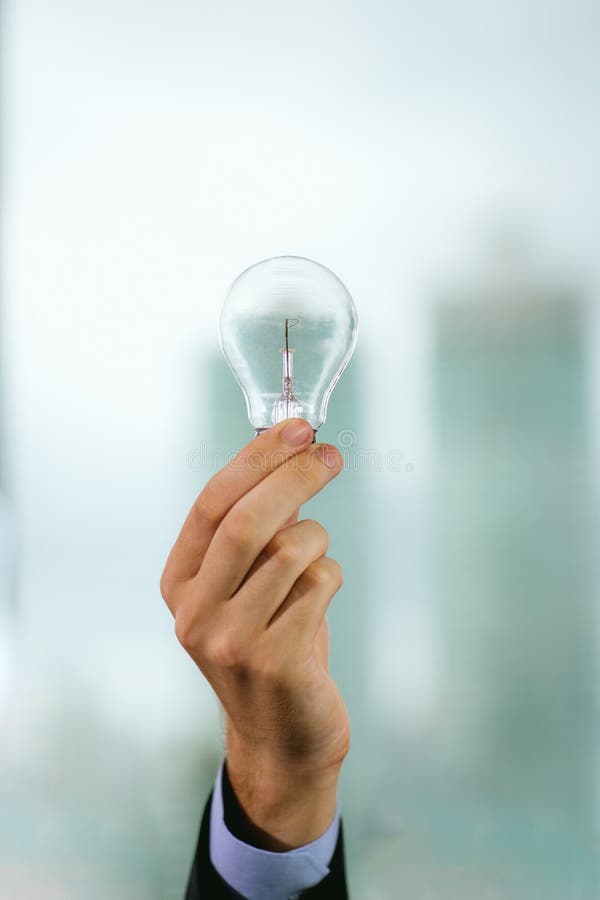 Businessman Holding Light Bulb. Brain Creative Thinking Ideas and ...
