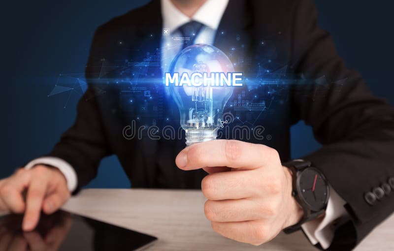 Businessman Holding a Light Bulb Stock Photo - Image of genius ...