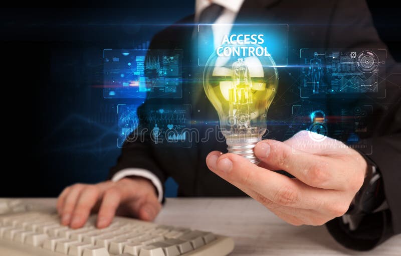 Businessman Holding a Light Bulb, Online Security Concept Stock Photo ...