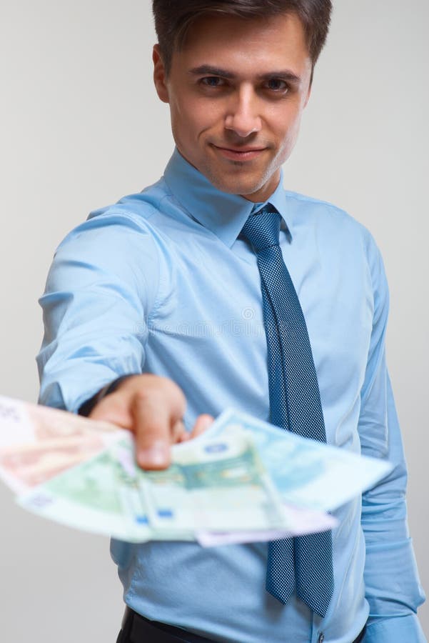Businessman Holding Money. Success and Wealth. Stock Photo - Image of ...