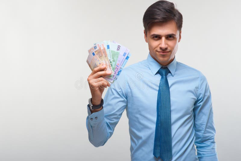 Businessman Holding Money. Success and Wealth. Stock Photo - Image of ...