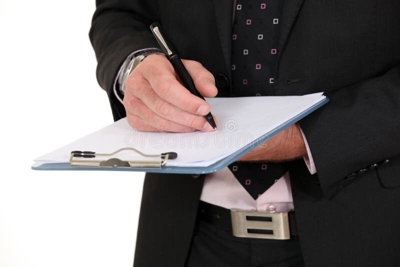 Businessman Holding a Notepad Stock Photo - Image of fashion, male ...