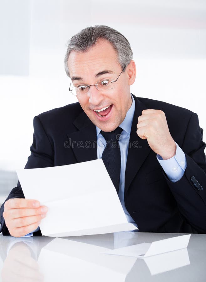 Businessman Holding Paper stock image. Image of grey - 57724577