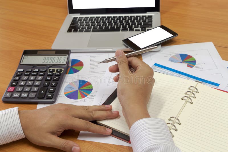 Businessman holding a pen stock image. Image of laptop - 79162493