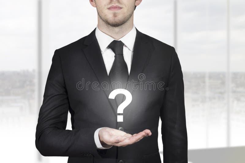 Businessman Holding Question Mark Stock Photo - Image of businessman ...