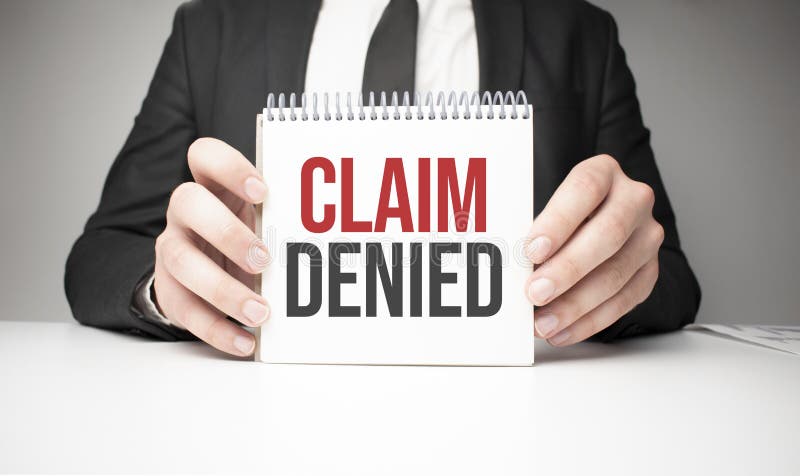 Businessman Holding Sheet of Paper with a Message Claim Denied Stock ...