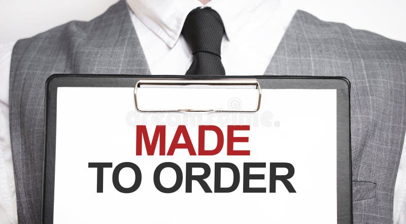 Businessman Holding Sheet of Paper with a Message MADE TO ORDER Stock ...