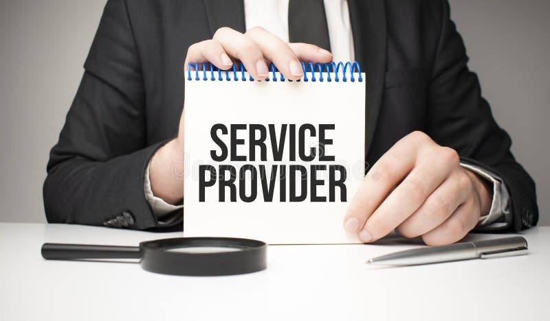Businessman Holding Sheet of Paper with a Message SERVICE PROVIDER ...