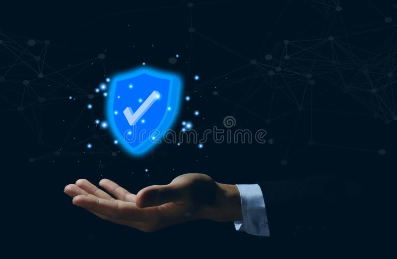 Businessman Holding a Shield Icon with a Lock Mark. Computer Data ...
