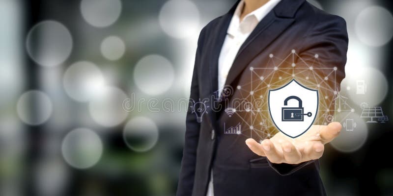 Businessman Holding a Shield Icon, Protection Concept, Computer Network ...