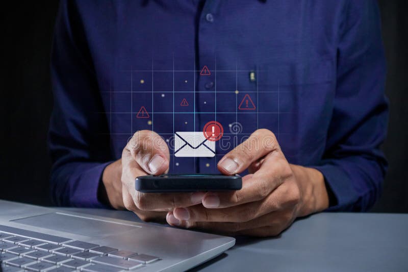Businessman Holding a Smartphone with Email or Message Spam ...