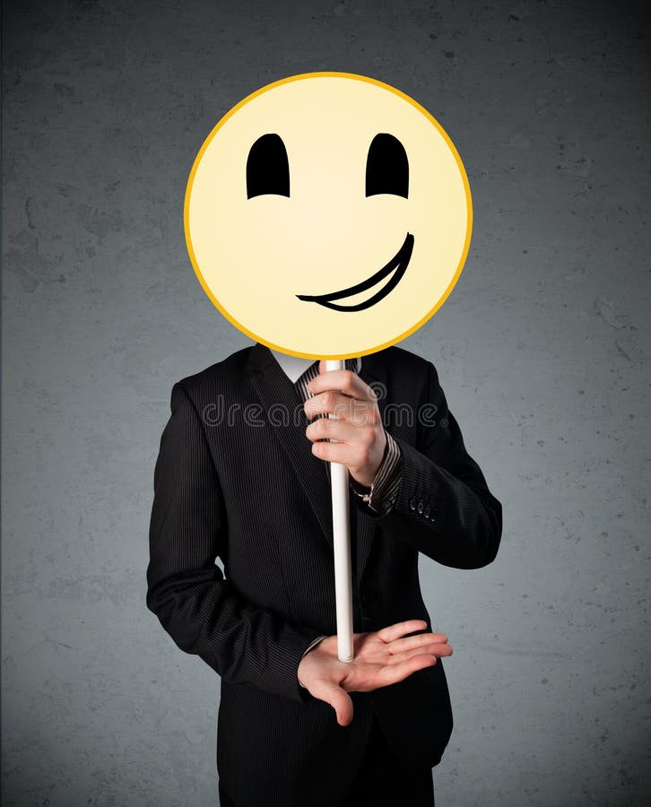 Businessman Holding a Smiley Face Emoticon Stock Image - Image of ...