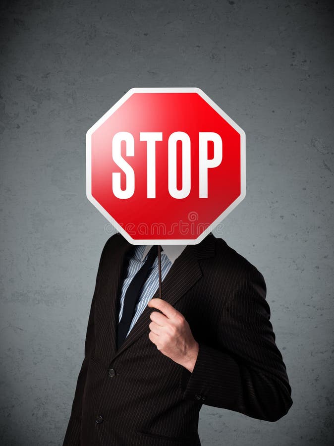 Businessman Holding a Stop Sign Stock Photo - Image of expression ...