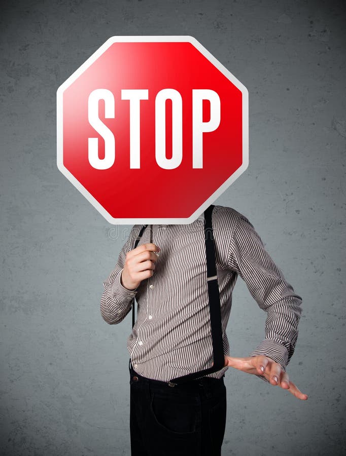 Man Gesturing Holding Traffic Sign Stop Stock Photos - Free & Royalty ...