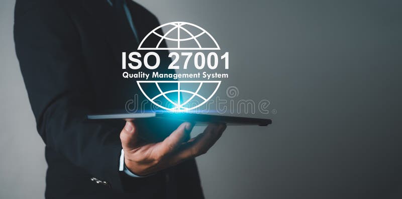 Businessman Holding a Tablet and Showing a Symbol ISO 2700, Information ...