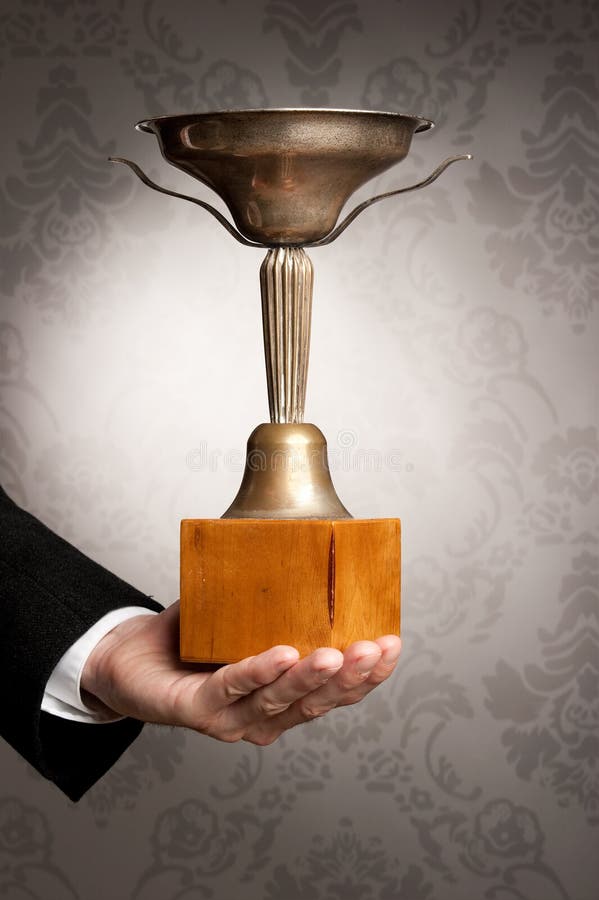 Businessman Holding a Trophy Stock Photo - Image of background ...