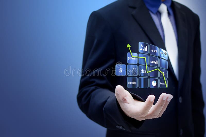 Businessman Holding Virtual Growth Interface with Digital Graphs and ...
