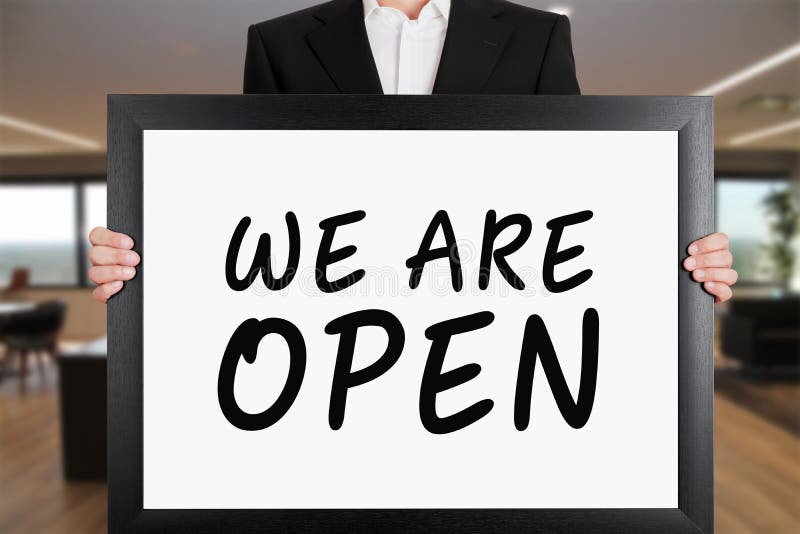 Businessman Holds a Signboard and Points His Finger To the Message ...