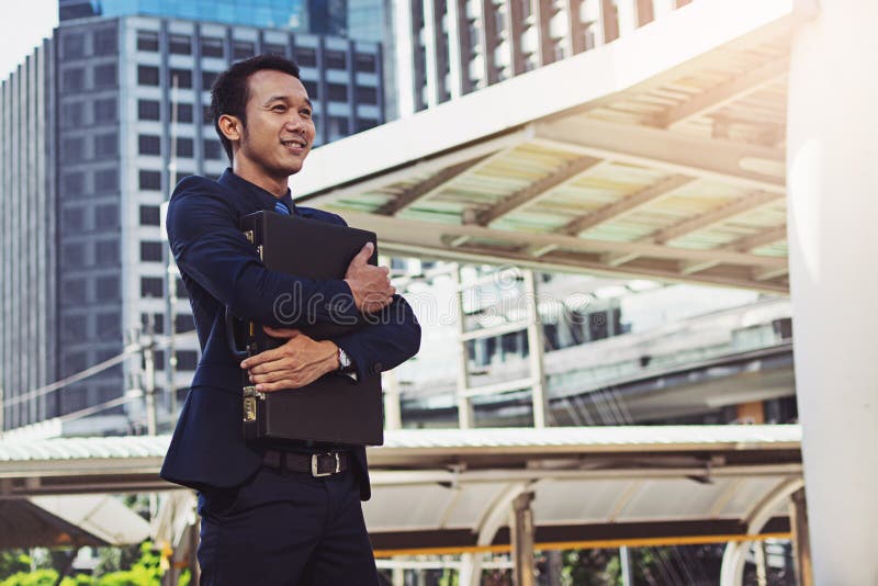 Businessman Hugging a Briefcase, Powerful Businessman Stock Image ...
