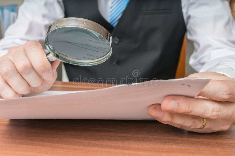 Inspection of Document with Magnifying Glass. Layer is Analysing ...