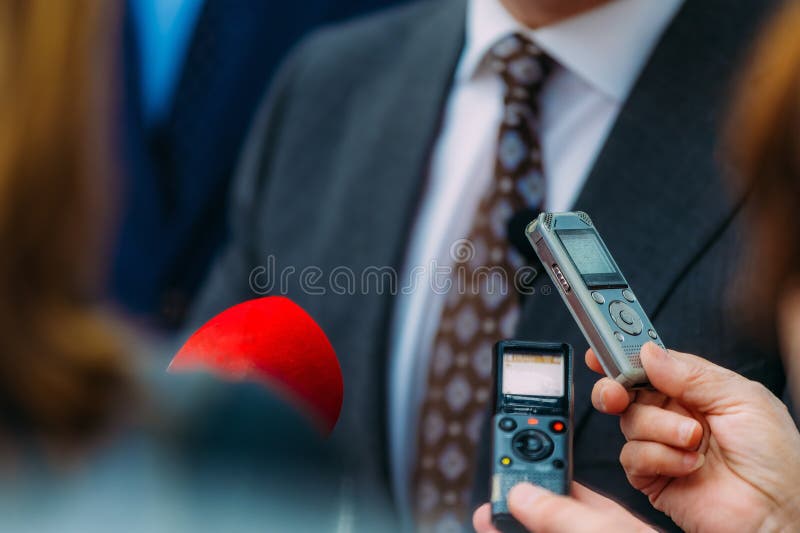 Businessman Talking in a Trade Show Interview Stock Photo - Image of ...