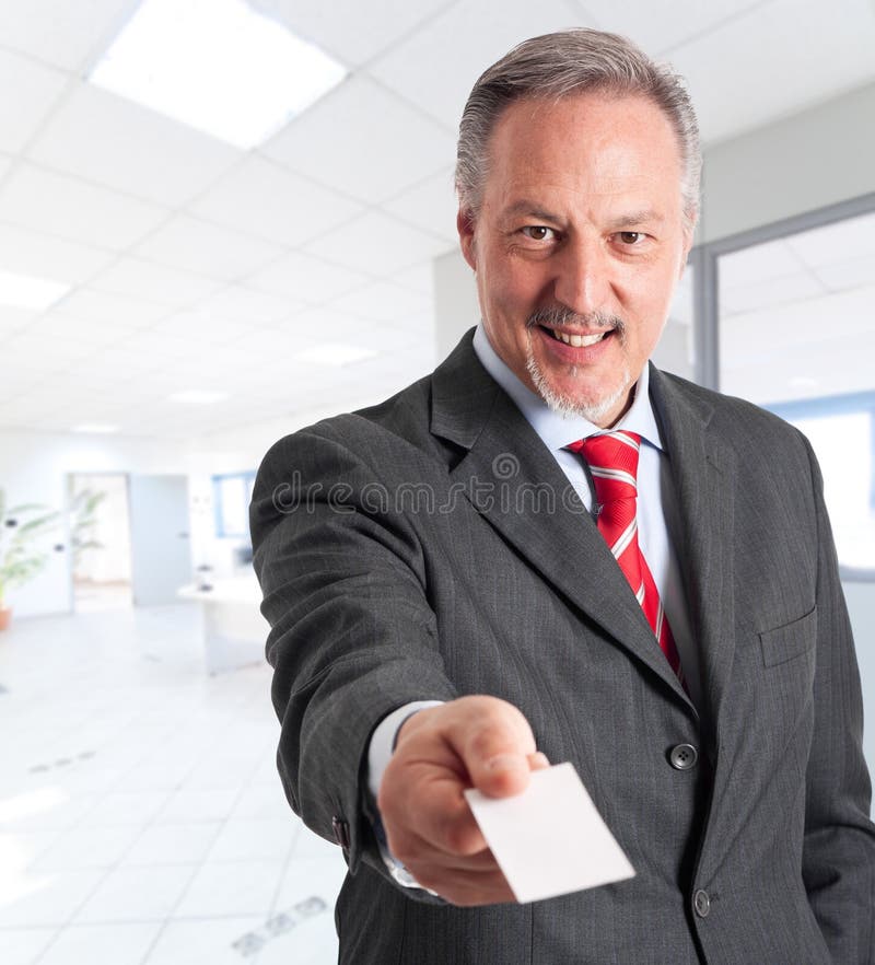 Businessman Introducing New Coworker To Employees during Meeting in ...