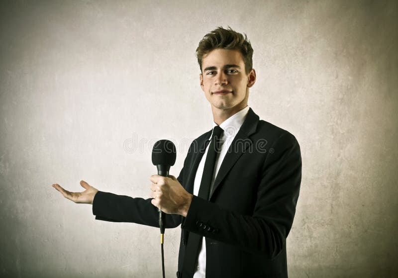 Businessman Introducing Someone Stock Image - Image of wall, announcer ...