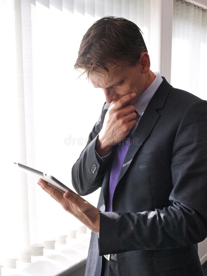 Businessman on ipad stock photo. Image of ipad, businessman - 21244350