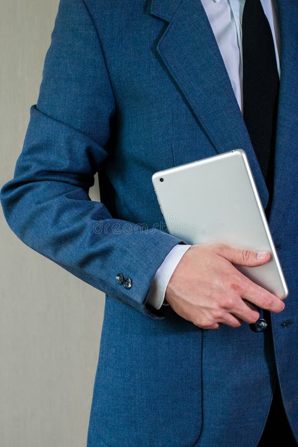 Businessman in a Jacket Holding a Tablet Stock Image - Image of ...